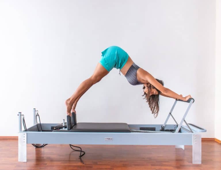 How to Use a Pilates Bar - Physioroom Blog
